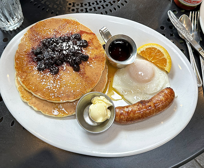 These pancakes don't just stack up against the competition – they tower over it, with berries that pop like tiny flavor bombs.