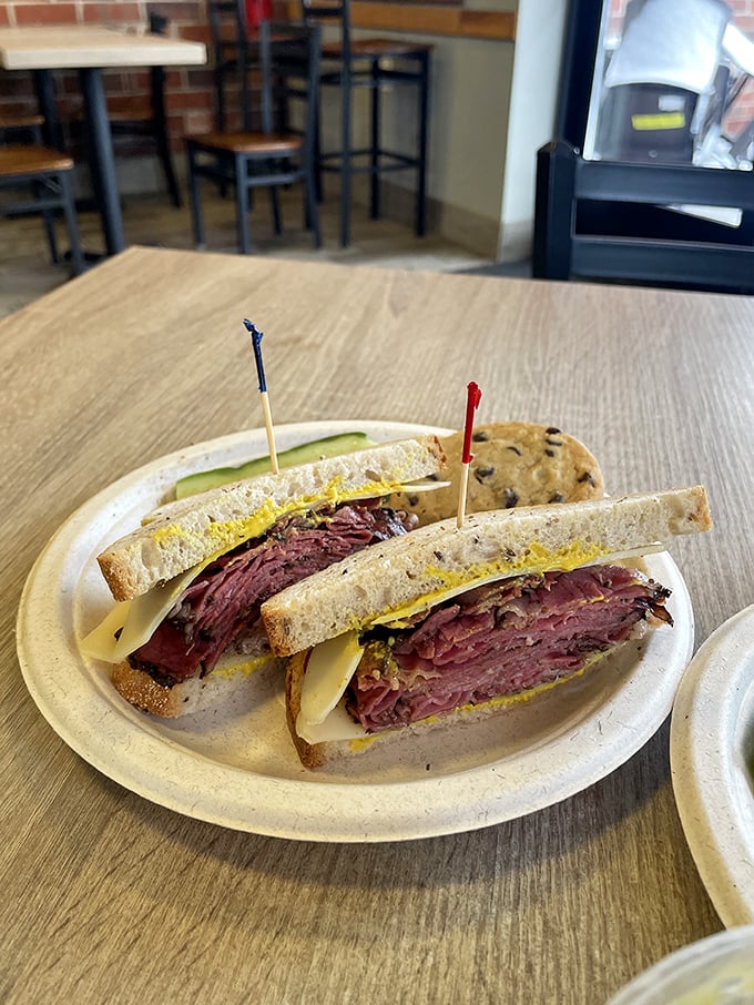This isn't just a sandwich – it's a skyscraper of pastrami architecture, where each floor is more delicious than the last. 