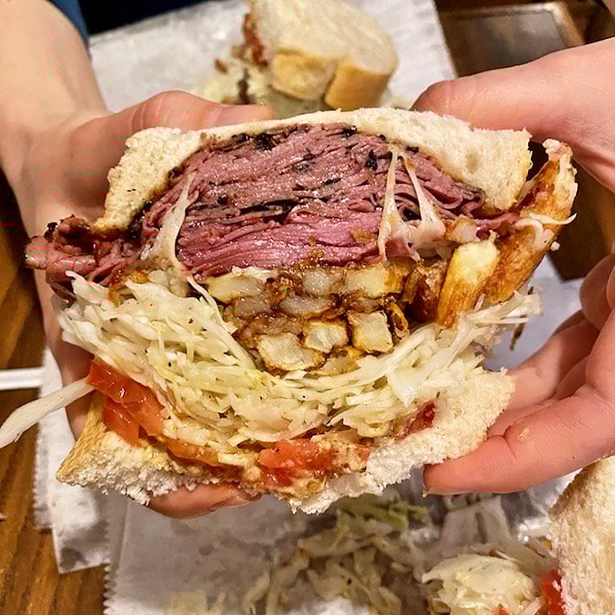 Pastrami piled higher than Pennsylvania's Allegheny Mountains. This isn't just a sandwich—it's a meaty masterpiece demanding respect and napkins.