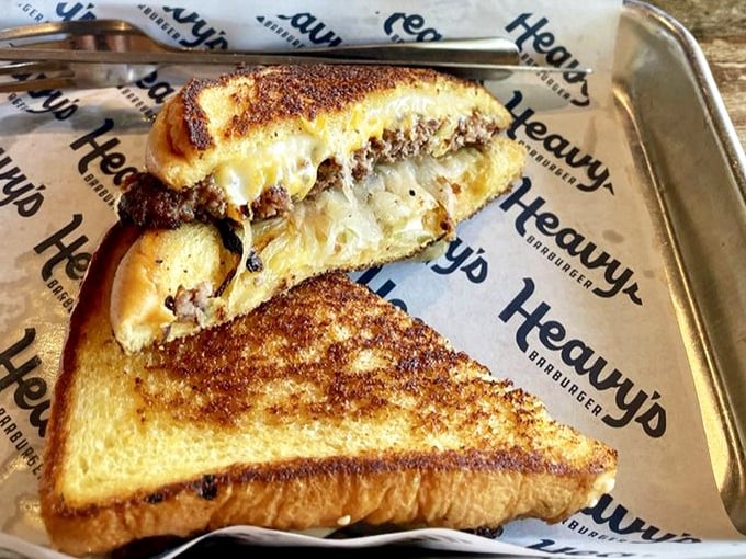The patty melt at Heavy's doesn't just flirt with perfection – it's in a committed relationship with it. Toasty, cheesy heaven.