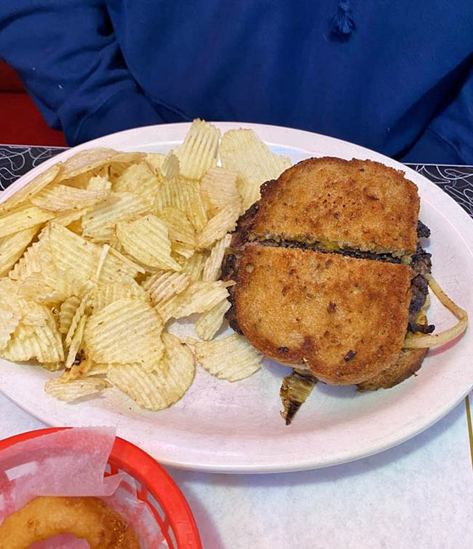 The humble patty melt—America's unsung lunch hero. This one's got the perfect crisp-to-gooey ratio that would make your cardiologist wince and your taste buds sing.