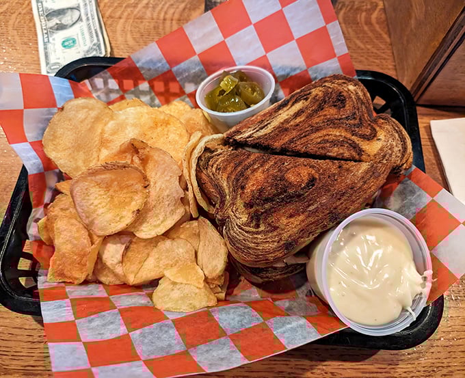 The patty melt and homemade chips—a dynamic duo that puts Batman and Robin to shame. That perfectly toasted rye deserves its own fan club.