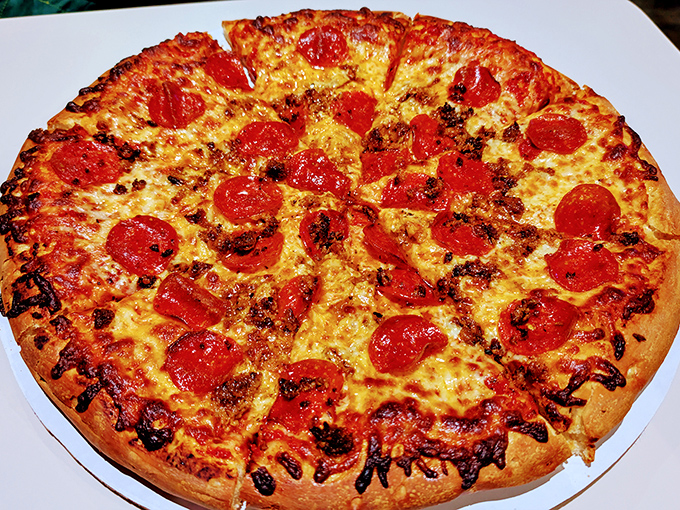 Pepperoni pizza perfection isn't complicated – it's about getting the basics absolutely right. Those crispy-edged pepperoni cups collect little pools of flavor magic.