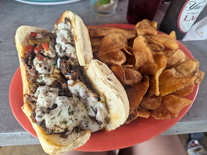 A proper Philly cheesesteak should require both hands and several napkins. This beauty checks all the right boxes.