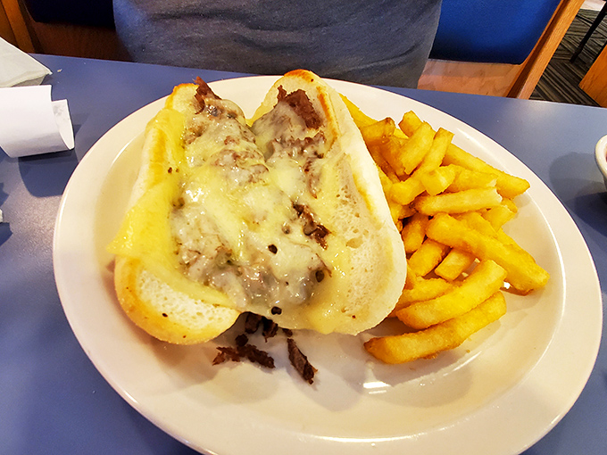 The Philly Cheesesteak arrives like a savory love letter from Pennsylvania, with melty cheese cascading over tender beef—a long-distance relationship worth maintaining.