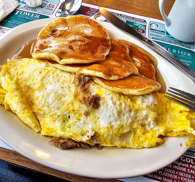 Breakfast alchemy at its finest—an omelet that somehow captures the soul of Philadelphia in fluffy egg form. Morning glory!