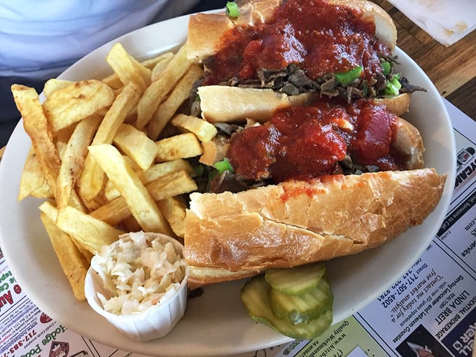 This isn't just a sandwich, it's an architectural achievement—a Philly cheesesteak that demands both hands and several napkins.