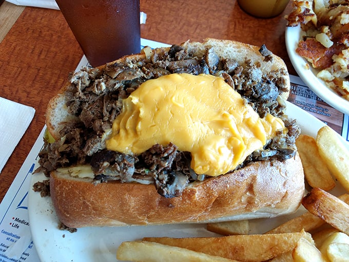 Not just a sandwich, but a Philly Cheesesteak masterpiece. Thinly sliced beef smothered in melted cheese—a true Pennsylvania handshake between bread.