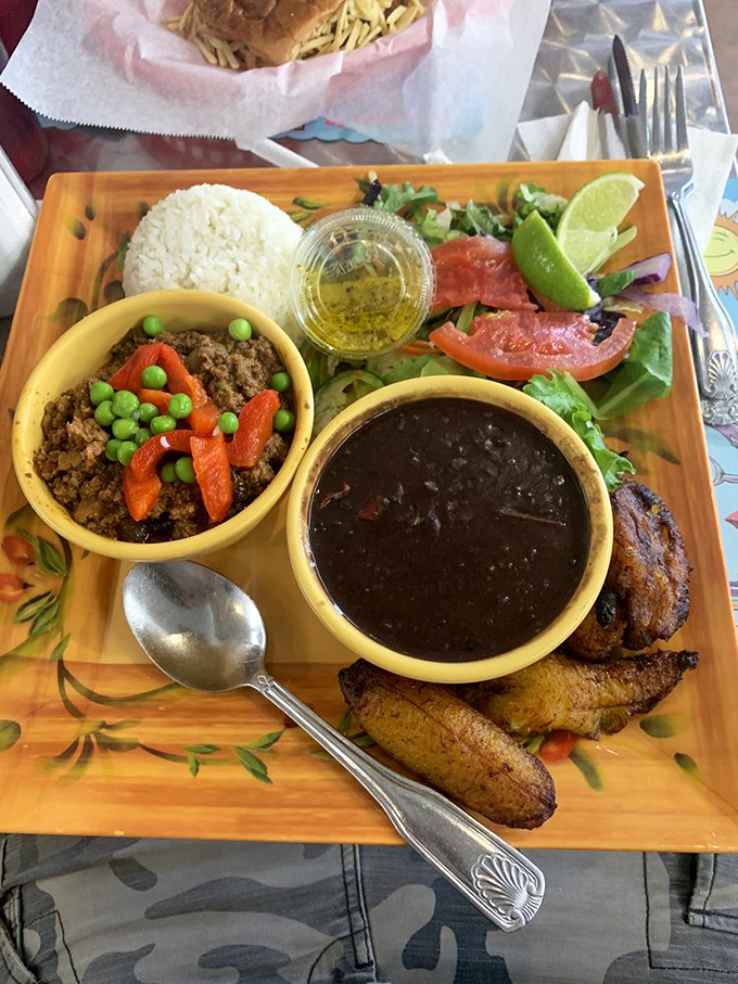 A plate that tells Miami's story. Black beans, picadillo, plantains, and rice – a cultural history lesson that happens to taste absolutely magnificent.