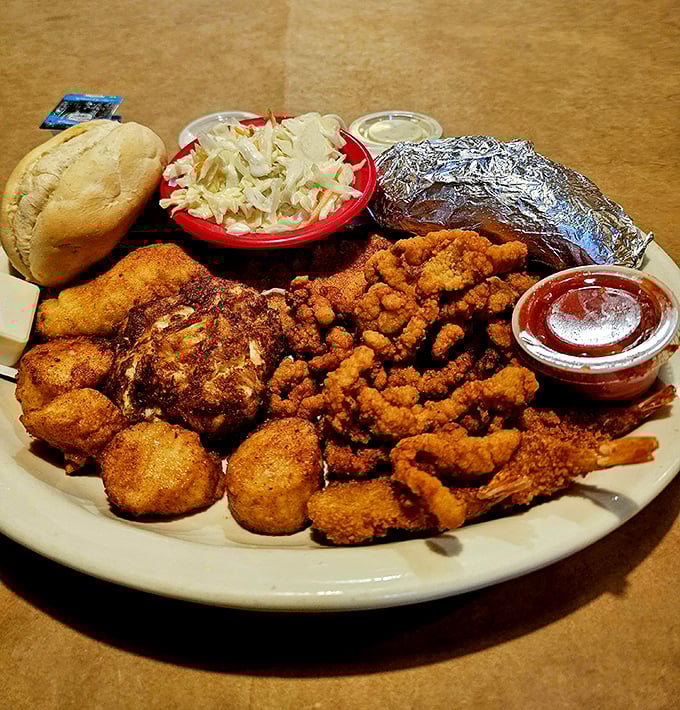 This platter doesn't need a fancy introduction—the golden-fried seafood, creamy coleslaw, and fresh roll speak volumes about Old Mill's priorities.