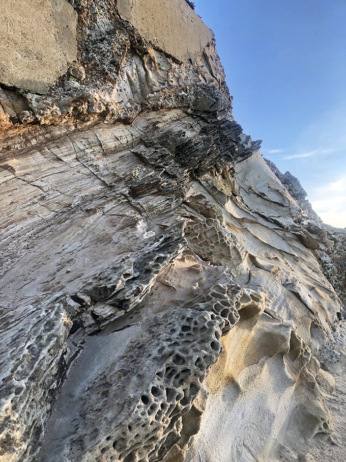 These aren't just rocks—they're geological time capsules, layered and textured like the world's most complicated mille-feuille pastry.