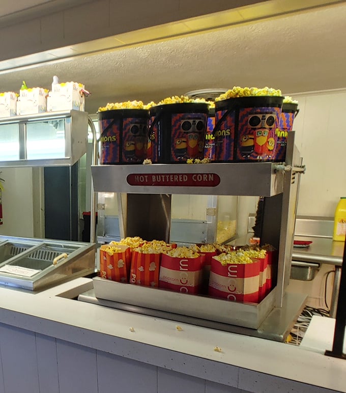 Movie theater popcorn perfection – buttery, golden mountains waiting to be devoured during coming attractions. Cinema's most essential companion.