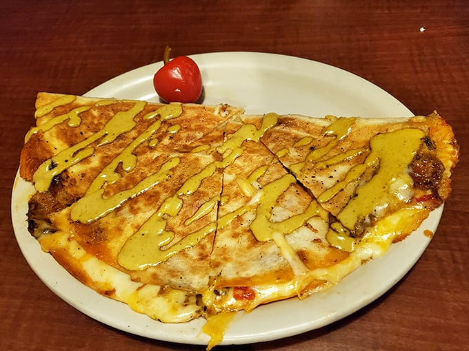 This isn't just any quesadilla – it's a Portuguese-inspired masterpiece drizzled with a sauce that'll have you plotting your return visit before you've finished.