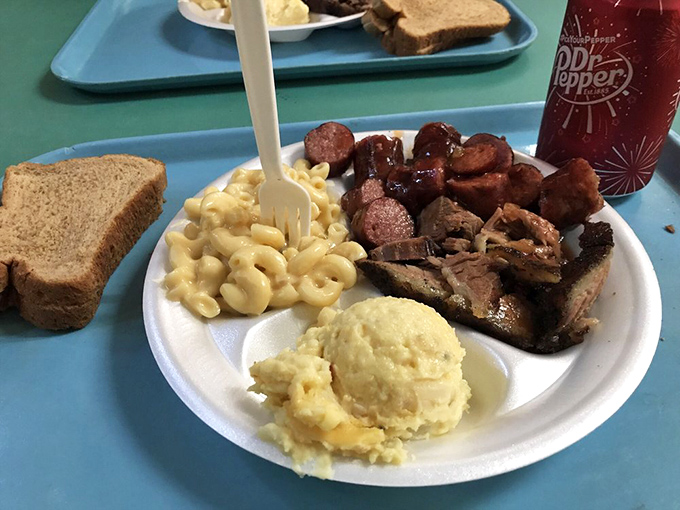 The Sam's experience distilled: meat that's the star, mac and cheese that comforts, and potato salad that cuts through the richness like a well-timed punchline.
