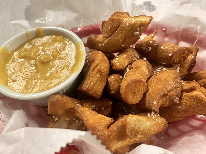 Golden-brown pretzel nuggets with mustard dip—the perfect beer companion that somehow makes you thirstier with every delicious, salty bite.