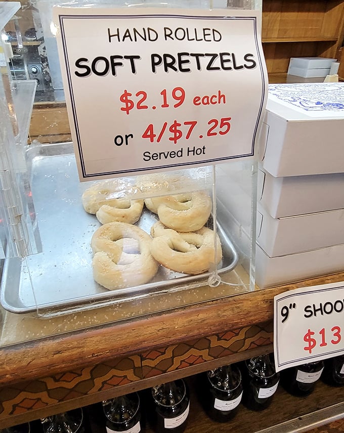 Hand-rolled soft pretzels displayed behind glass – a carb-lover's dream that pairs perfectly with local mustard and a hearty appetite.