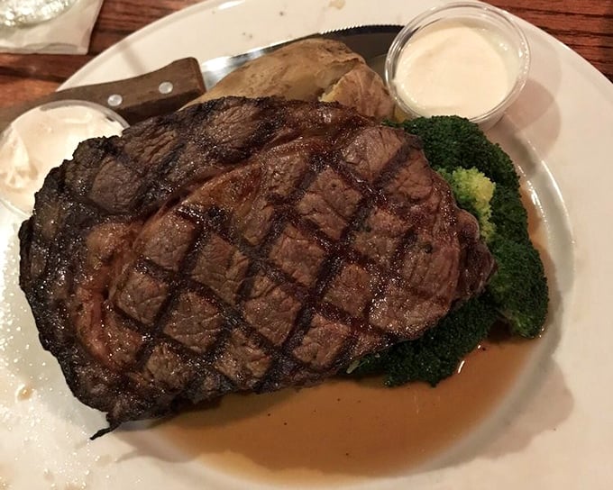 A prime rib that doesn't need a passport to transport you to steakhouse nirvana—perfectly charred exterior, blushing interior.