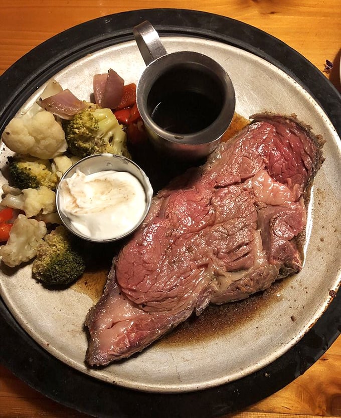 Prime rib so tender it practically surrenders at the sight of your fork. The au jus cup stands ready for dunking adventures.