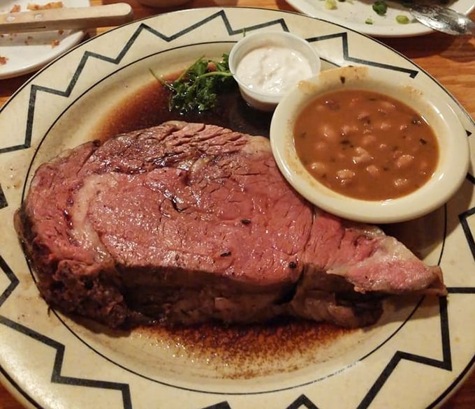 Prime rib so perfectly pink it could make a vegetarian question their life choices. Those cowboy beans aren't just a side dish – they're a revelation.