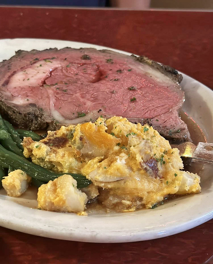 This prime rib isn't just cooked—it's been lovingly persuaded to perfection. The rosy center practically whispers "you made the right choice" with every bite.