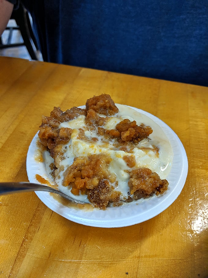 Not your average dessert—this creamy concoction with crunchy topping might be worth the extra mile on tomorrow's walk. Calories don't count when they taste this good.