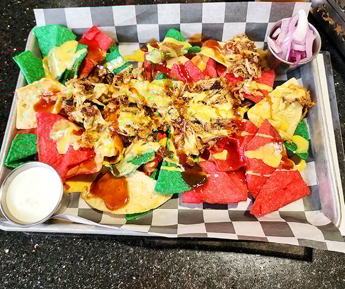 These colorful pulled pork nachos don't just cross borders—they demolish them, creating a United Nations of flavor on a single tray.