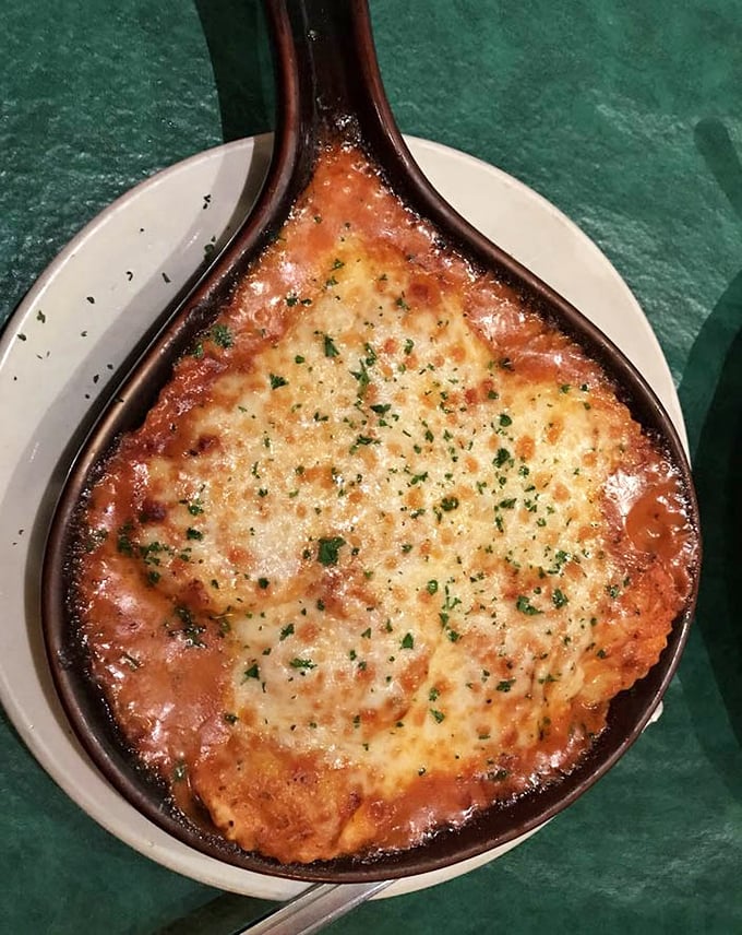 This isn't just ravioli—it's edible art served in a ceramic skillet. The sauce-to-cheese ratio achieves what mathematicians call "the golden delicious proportion."
