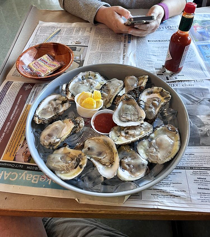 These oysters aren't just fresh—they're still contemplating their life choices. A squeeze of lemon, a dash of cocktail sauce, and pure oceanic bliss follows.