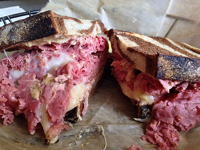 The Reuben here doesn't just satisfy hunger – it resolves existential crises with its perfect marriage of corned beef, sauerkraut, and melted Swiss.