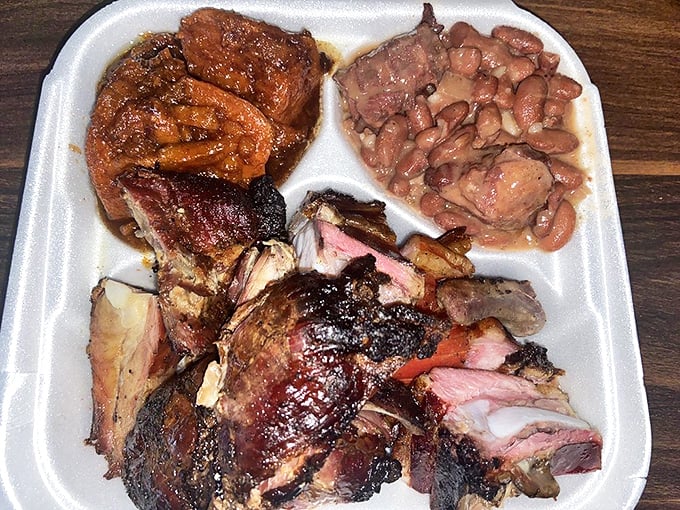 A BBQ sampler that would make a vegetarian weep. The smoke ring on that brisket is the equivalent of a Michelin star in BBQ circles.