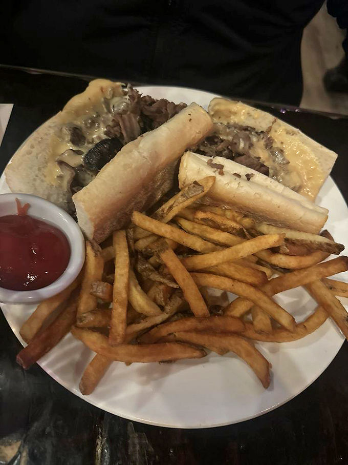 The sandwich that launched a thousand cravings. Thinly sliced ribeye meets melted cheese in this Philadelphia classic that demands to be devoured immediately.