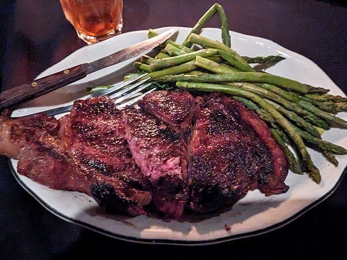 This ribeye with grilled asparagus isn't just dinner—it's a celebration of fire meeting beef in perfect harmony. The char speaks volumes.