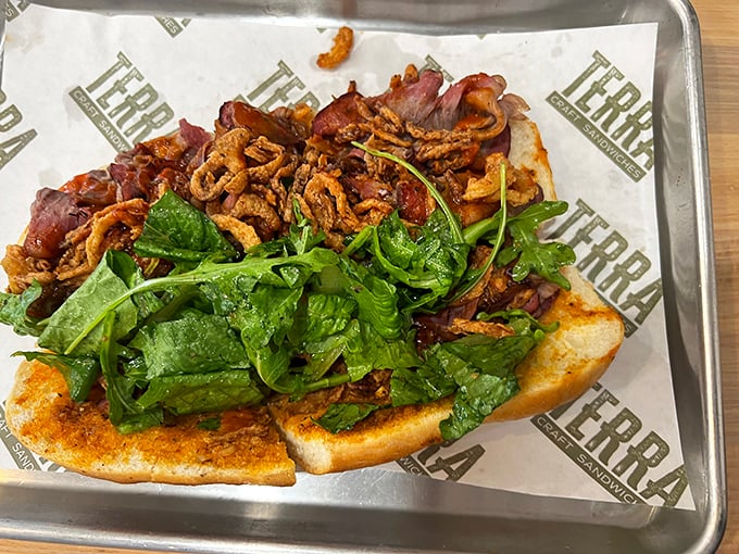 Crispy meets fresh in this open-faced masterpiece where arugula and bacon create the kind of harmony that would make Simon and Garfunkel jealous.