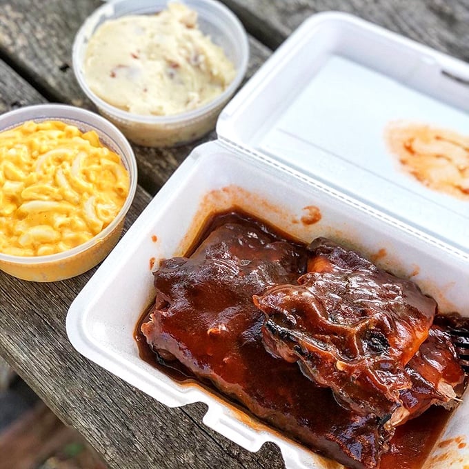 BBQ ribs with mac and cheese—a combination so perfect it should have its own national holiday. The sauce-lacquered meat practically begs to be devoured.