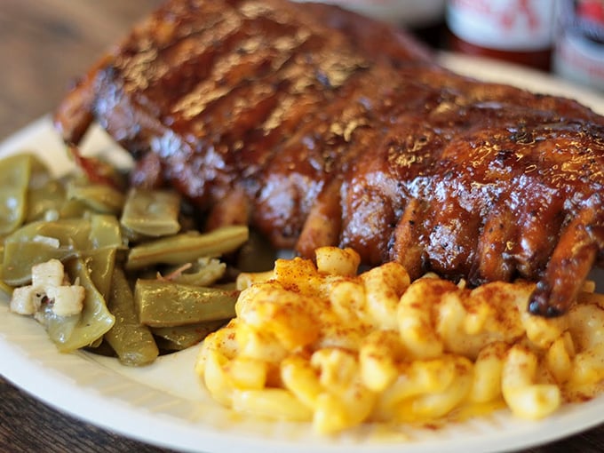 When ribs glisten like that, time slows down. The perfect trinity of meat, mac and cheese, and green beans creates the holy grail of comfort.
