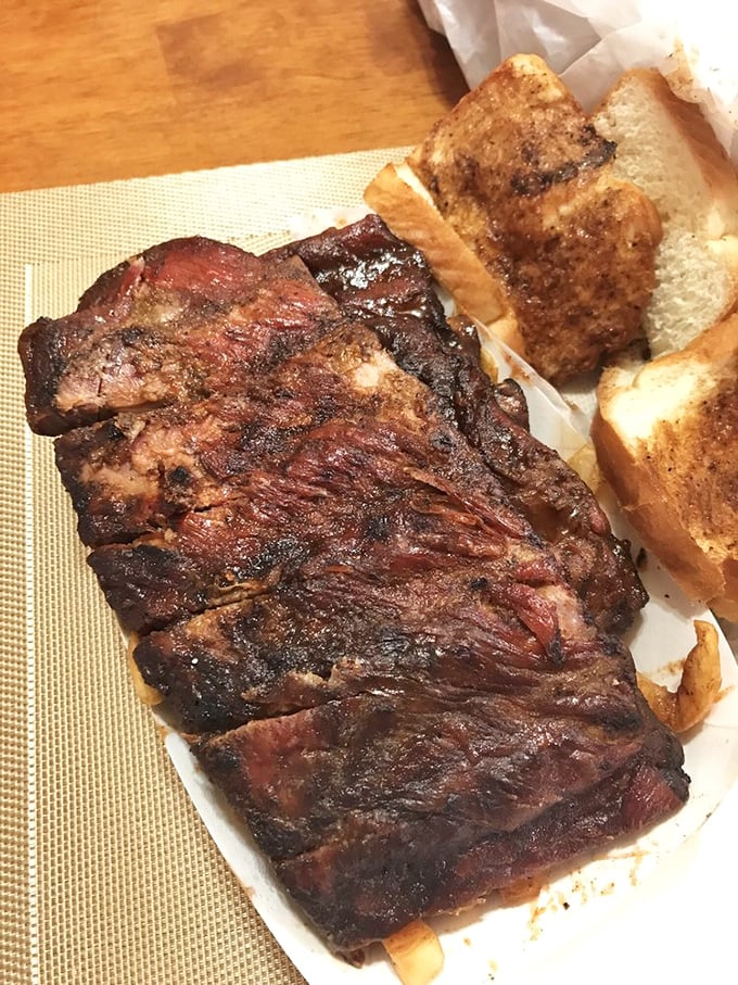 Barbecued ribs at Lem's achieve that mythical texture—firm enough to hold together yet yielding to the gentlest tug of teeth.