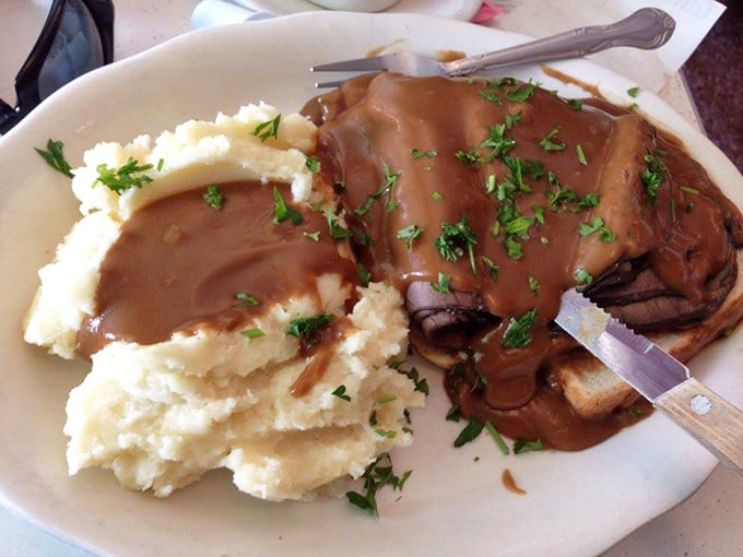 Hot roast beef with gravy and mashed potatoes—the kind of meal that makes you want to hug the chef and take a nap afterward.