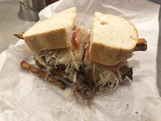 The roast beef sandwich arrives looking like it's been hitting the gym – absolutely stacked and proud of it.