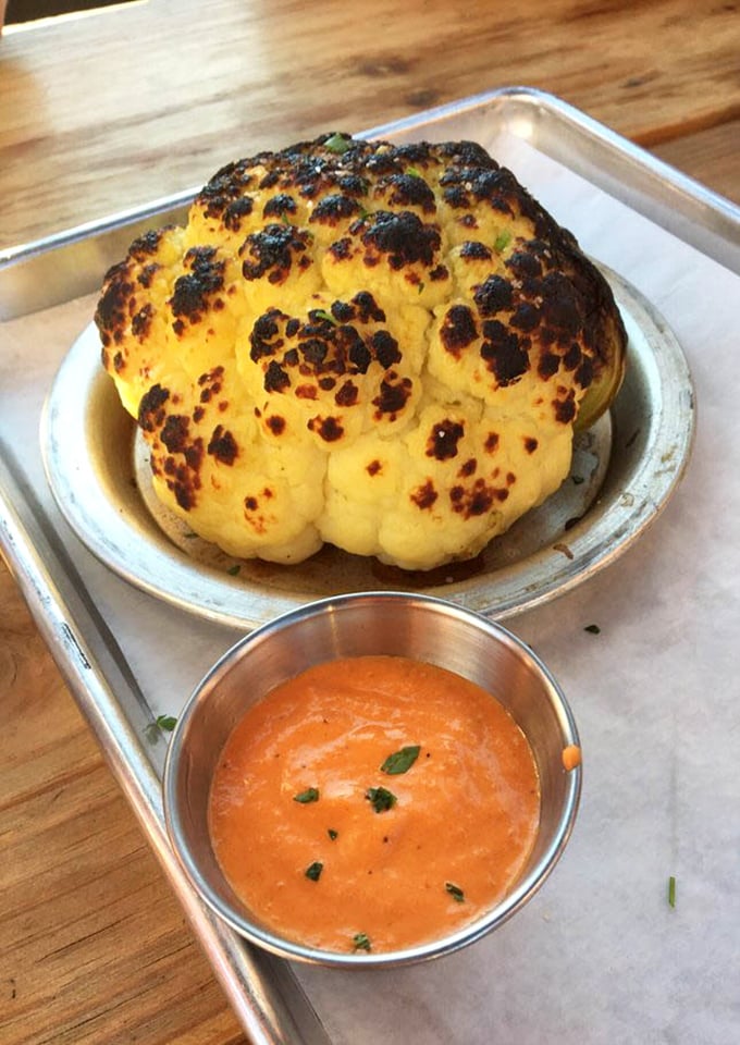 Behold the whole roasted cauliflower—nature's most underrated vegetable transformed into a caramelized masterpiece that could convert even the most dedicated carnivore.