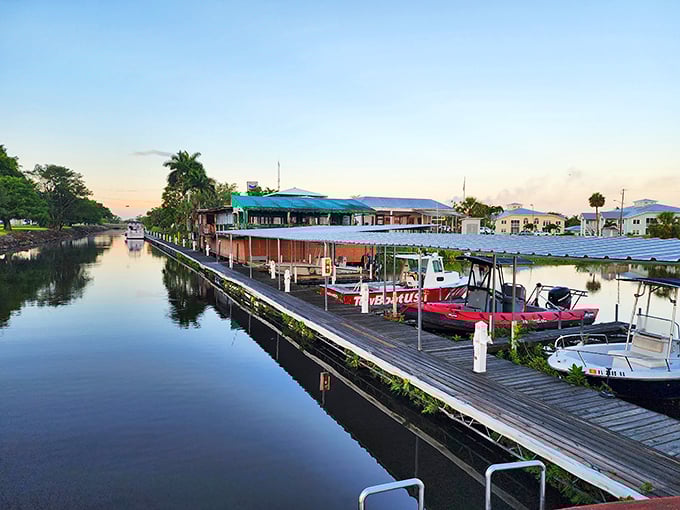 Roland Martin Marina at sunset – where boats rest after a day's adventure and the water reflects the sky's artwork better than any museum could. 