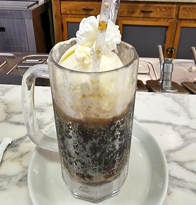 Root beer float so authentic it should come with its own leather jacket and pompadour. The straw stands up straight—no slouching allowed. 