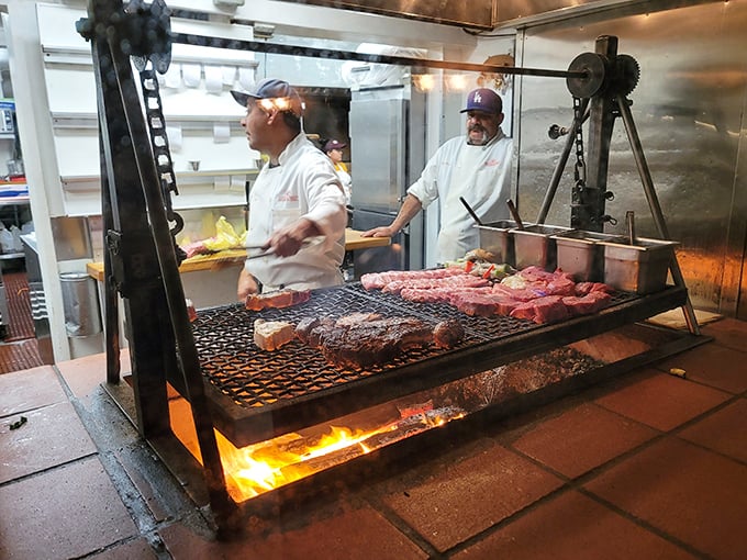 The ancient ritual of Santa Maria-style barbecue unfolds before your eyes. Those oak-fired flames aren't just cooking meat—they're creating edible California history.