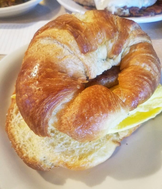 This croissant sandwich isn't trying to be French or fancy—it's just buttery, golden, and ready to make your morning significantly better.