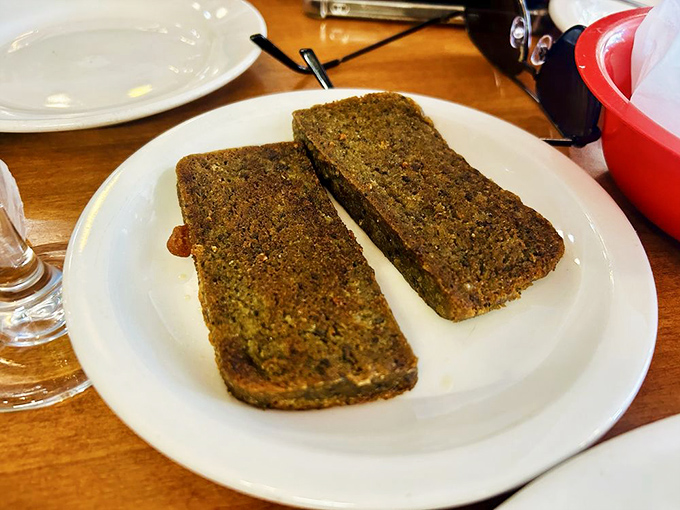 Scrapple toast—that mysterious mid-Atlantic breakfast delicacy that divides families but unites the brave souls who appreciate culinary tradition.