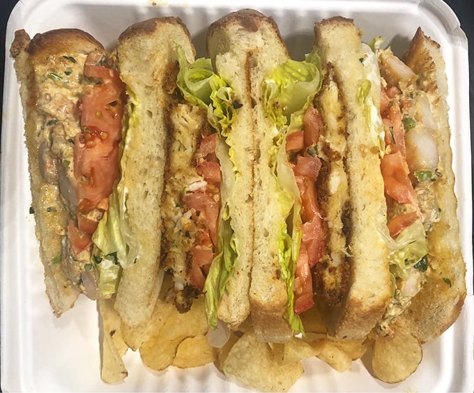 This seafood club sandwich doesn’t just stack ingredients—it architects them into a masterpiece that makes lunch the day’s main event.