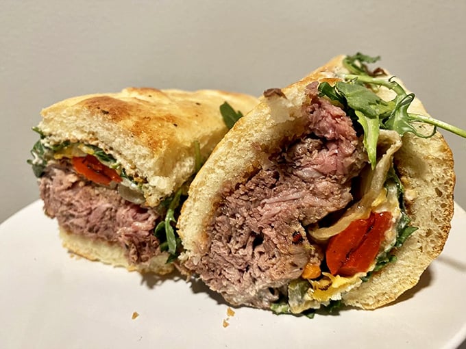 Behold the Shaved Prime Rib—where tender meat meets melty cheese in holy matrimony. This isn't just a sandwich; it's a religious experience.