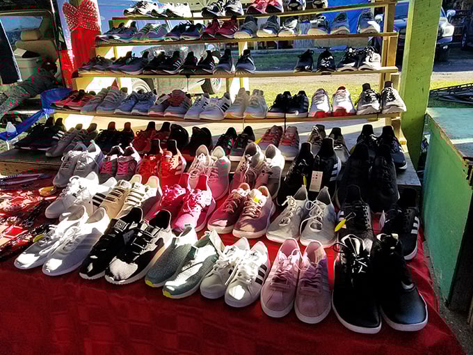 Sneaker paradise where footwear dreams come true. The red display cloth might as well be a red carpet for these kicks seeking new adventures.