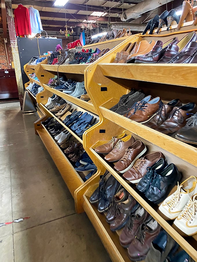 The shoe section: where leather loafers and vintage boots line up like hopeful contestants on a dating show, each one looking for its perfect match.