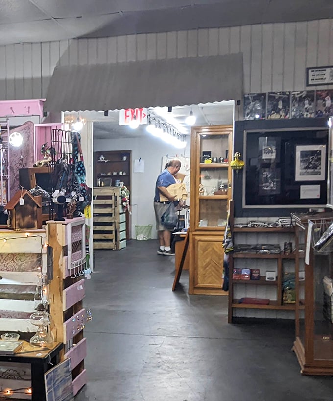 The serious business of treasure hunting in action. That focused expression is one all collectors know—the thrill of being on the verge of discovery.