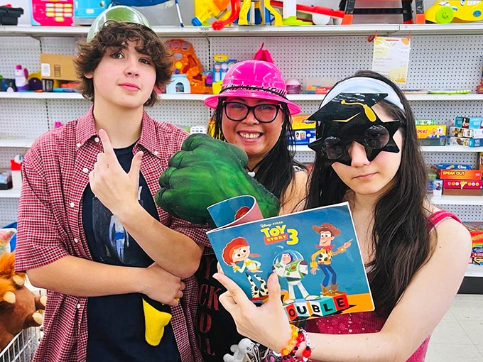 The store becomes a playground where trying on personalities is part of the experience. That Hulk hand might just complete your living room décor.
